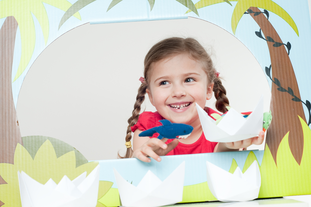 Turn a Folded Piece of Cardboard into a Cute Puppet Theater - Studio 5