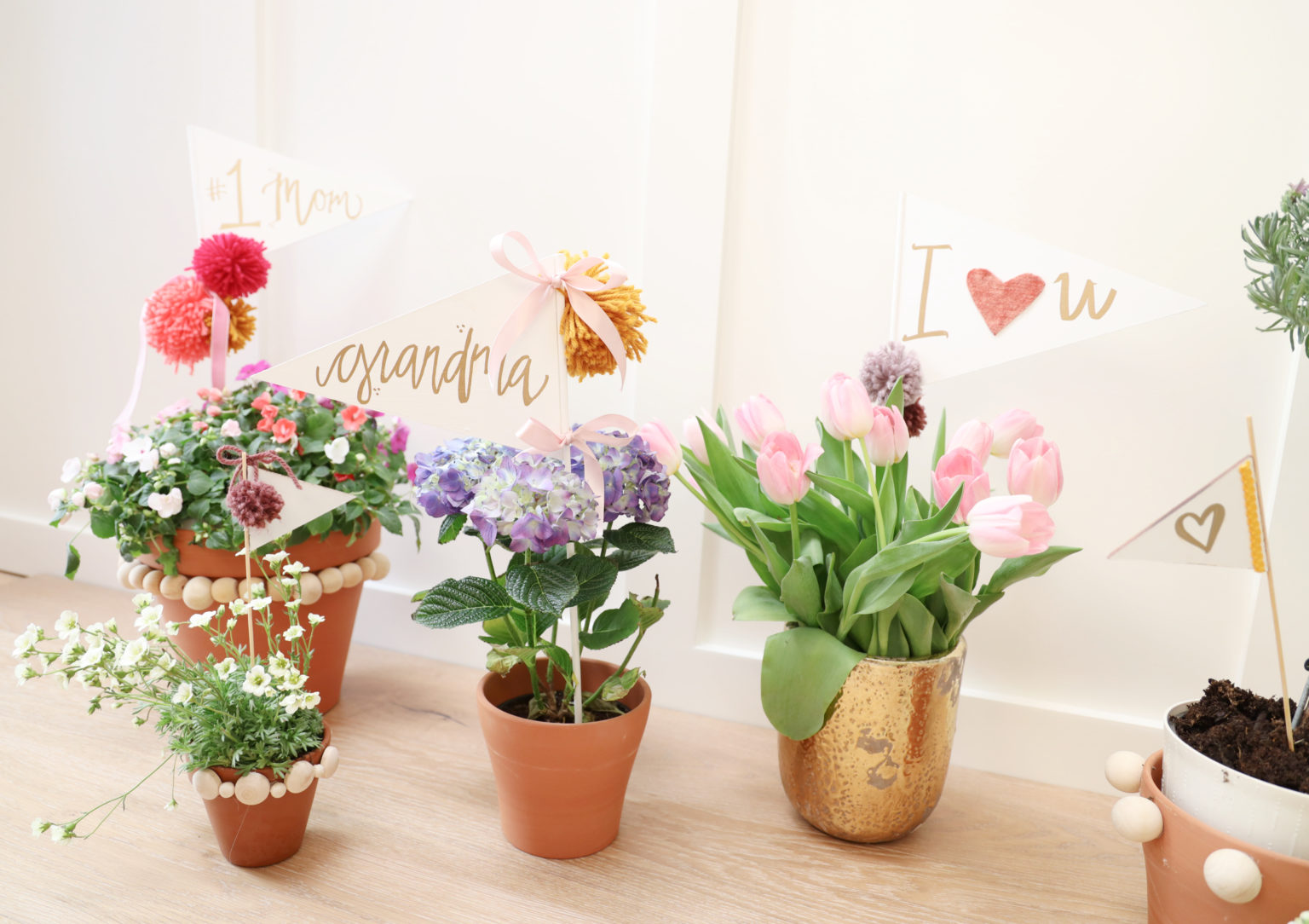 Need a cute Mother's Day craft? These flower pots are adorable AND easy ...