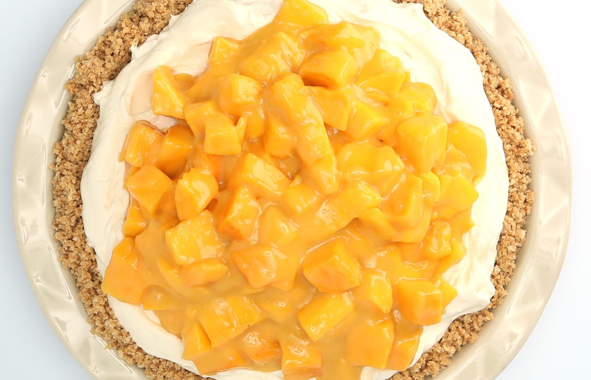 This Tangy Mango Passionfruit Cream Pie is Summer in a Dessert