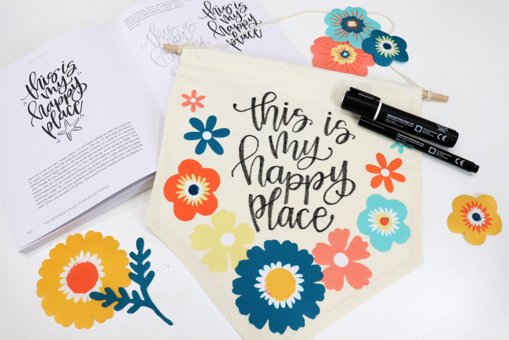 This Hand-Lettered Banner Craft is Cute Décor for a Dorm or Homework Space