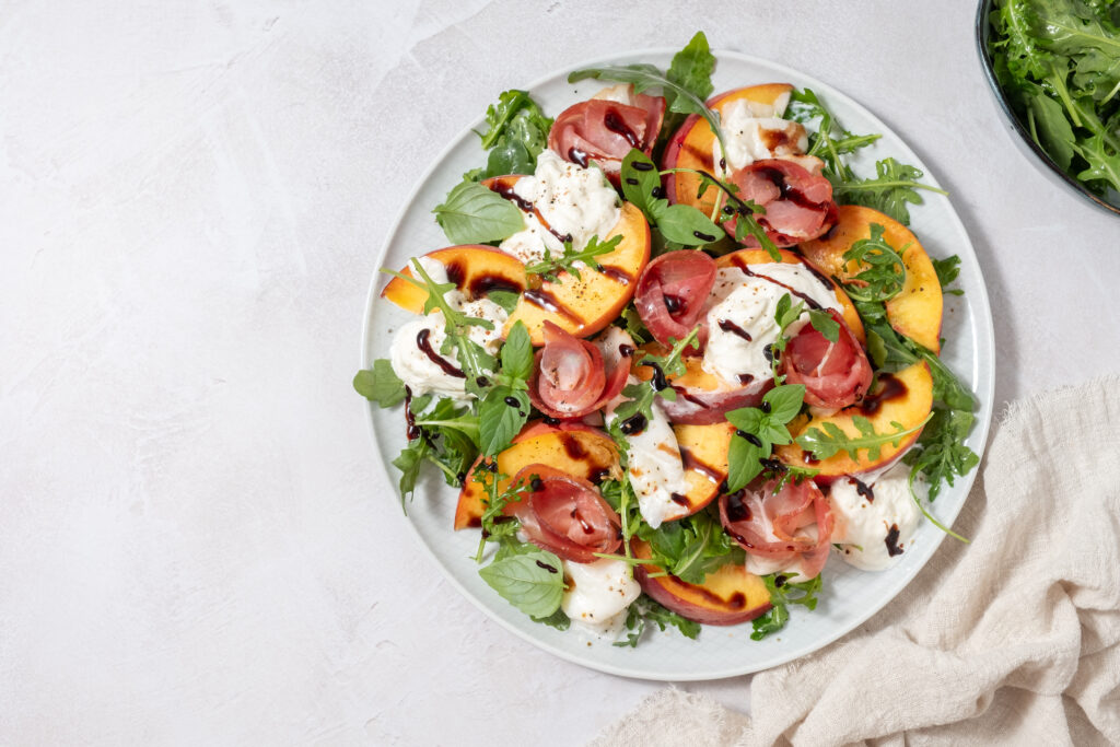 This Vibrant Peach Burrata Salad Highlights Everyone's Favorite Fall Fruit