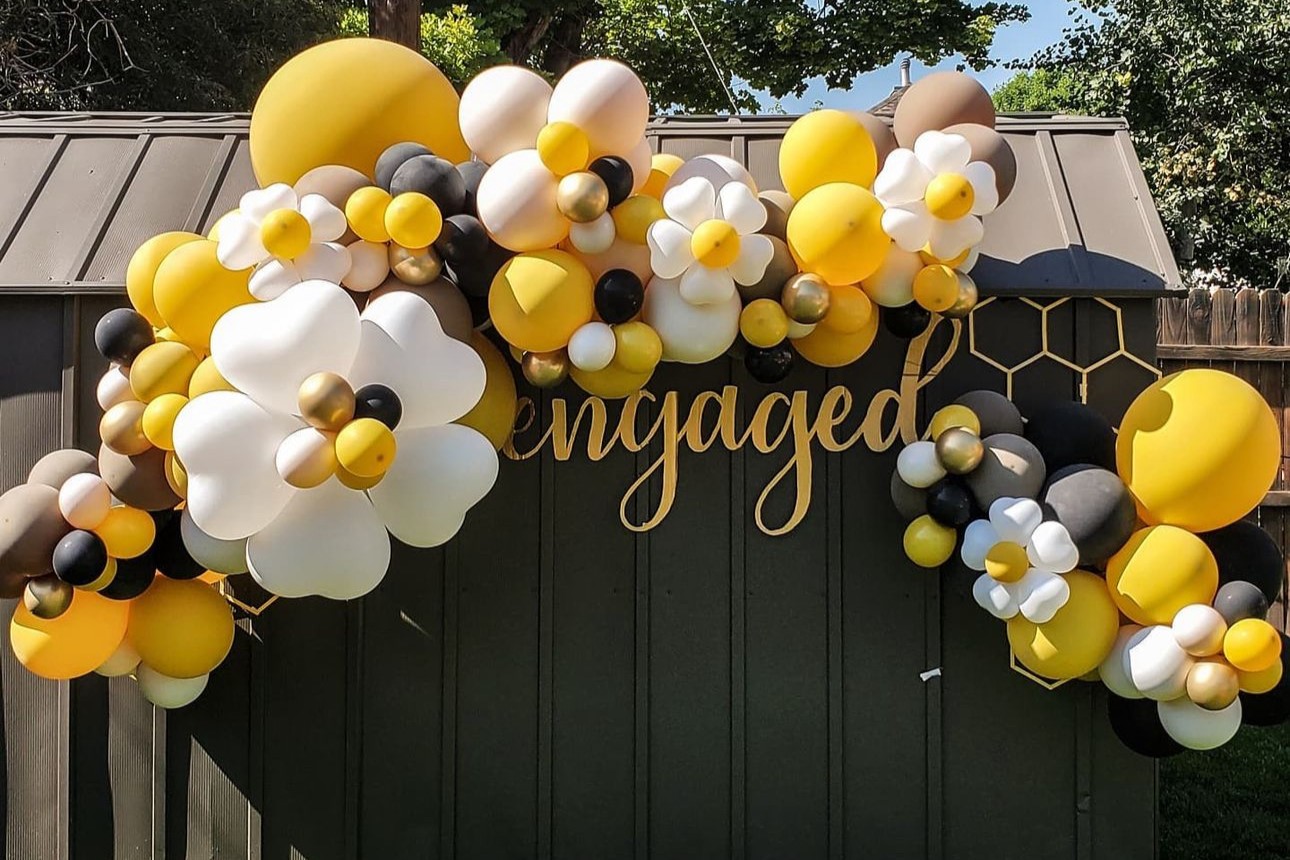 Bring spring to your party display with balloon flowers! Here's how to ...